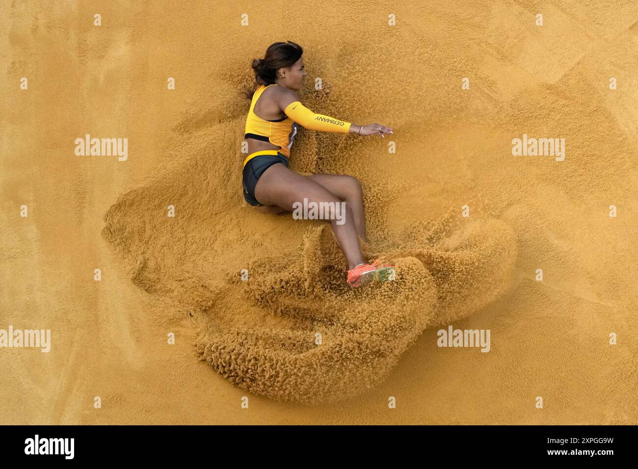 Laura Raquel Mueller, of Germany, competes in the women's long jump ...