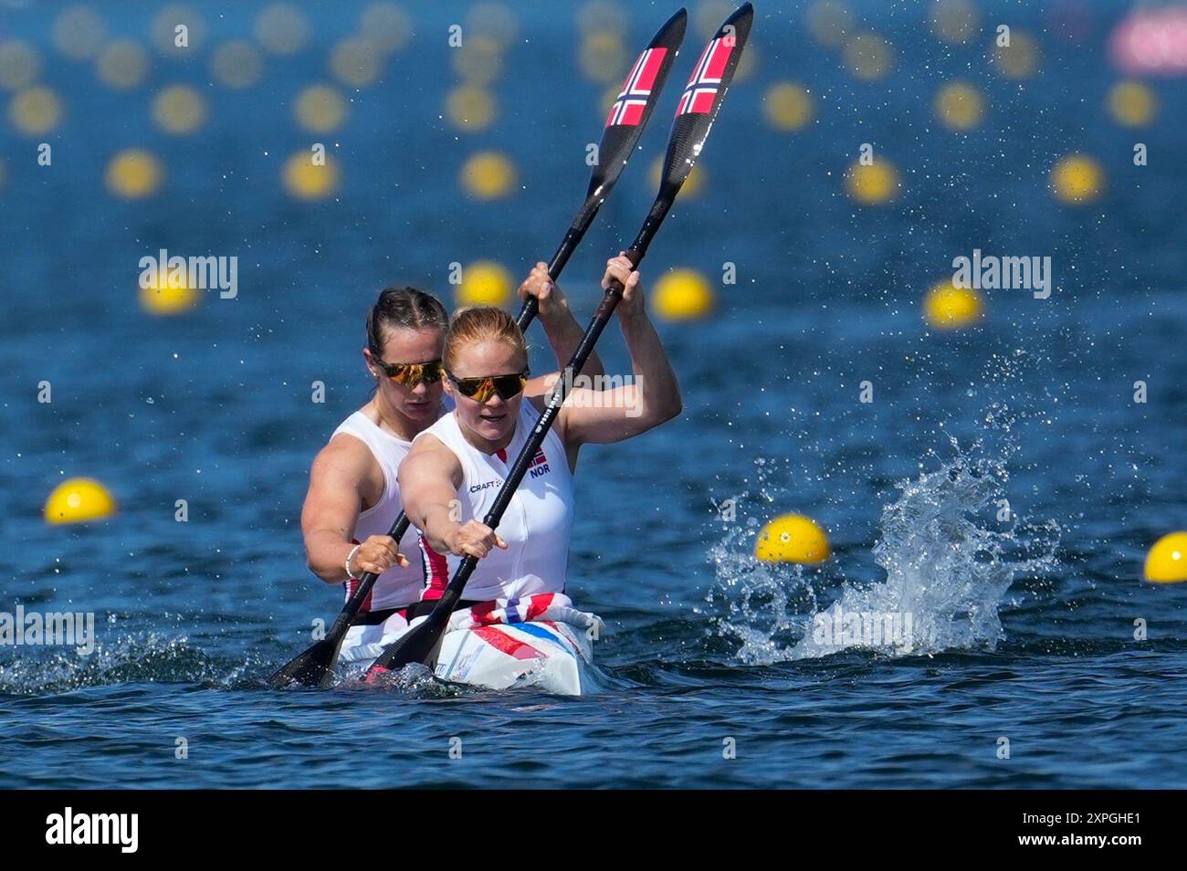 Norway's Anna Margrete Sletsjoee and Maria Virik compete in the women's ...