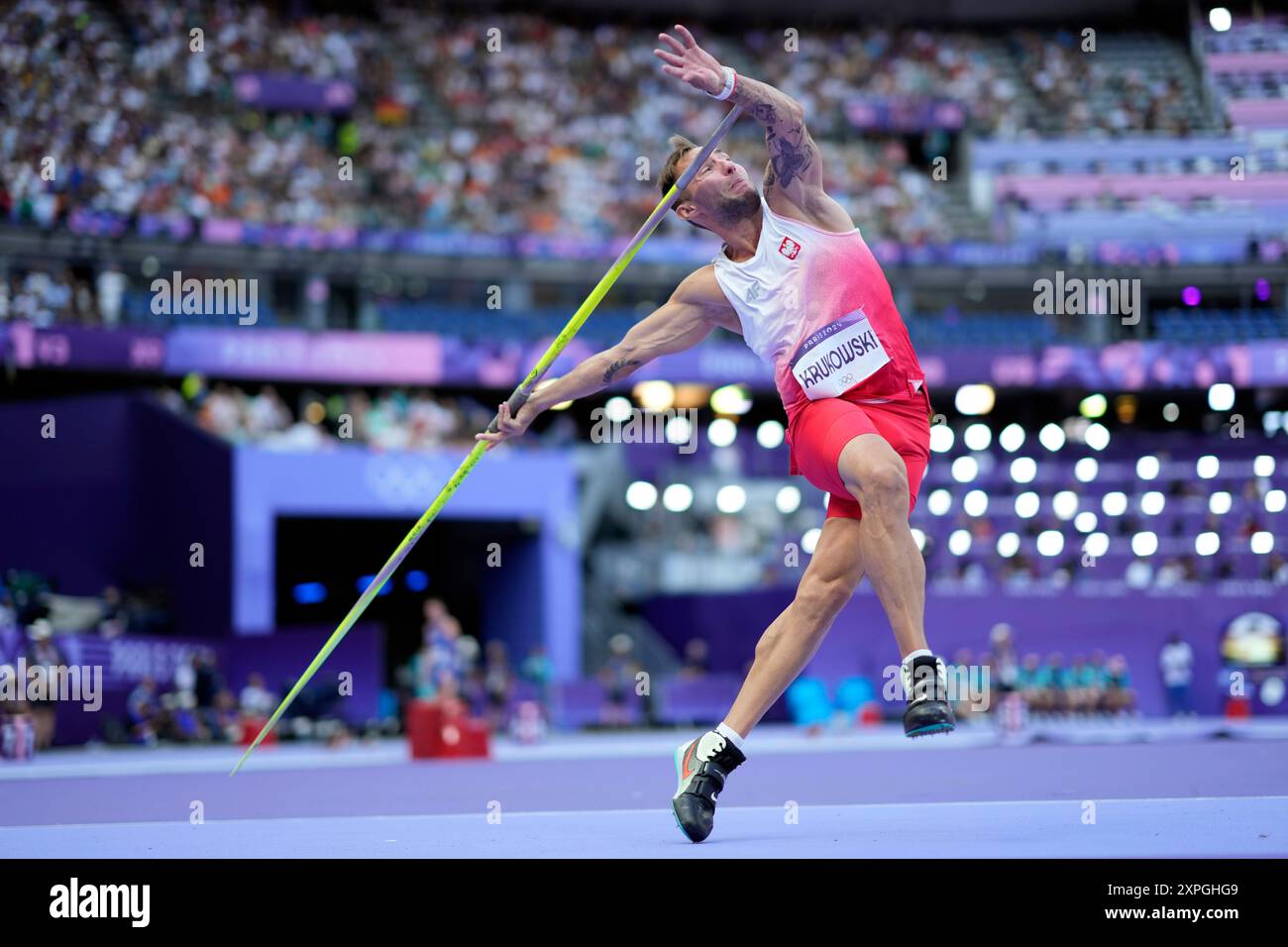 Marcin Krukowski, of Poland, competes during the men's javelin throw ...
