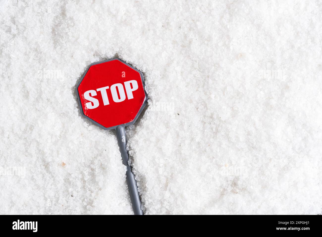 Stop sign on pile of white salt. Conceptual image stop salt Stock Photo ...