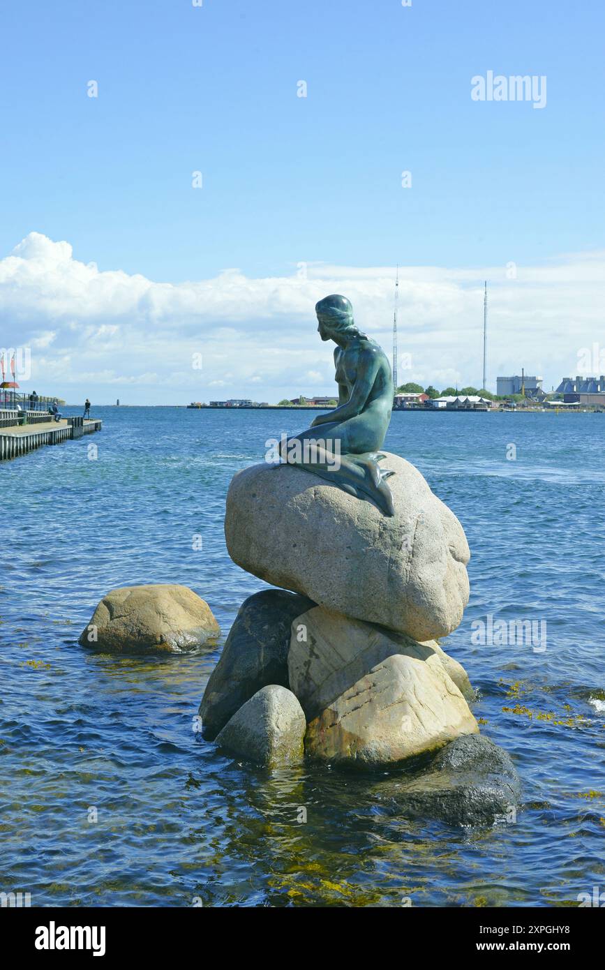 The Little Mermaid is a bronze mermaid sculpture by Danish sculptor Edvard Eriksen, located on ...