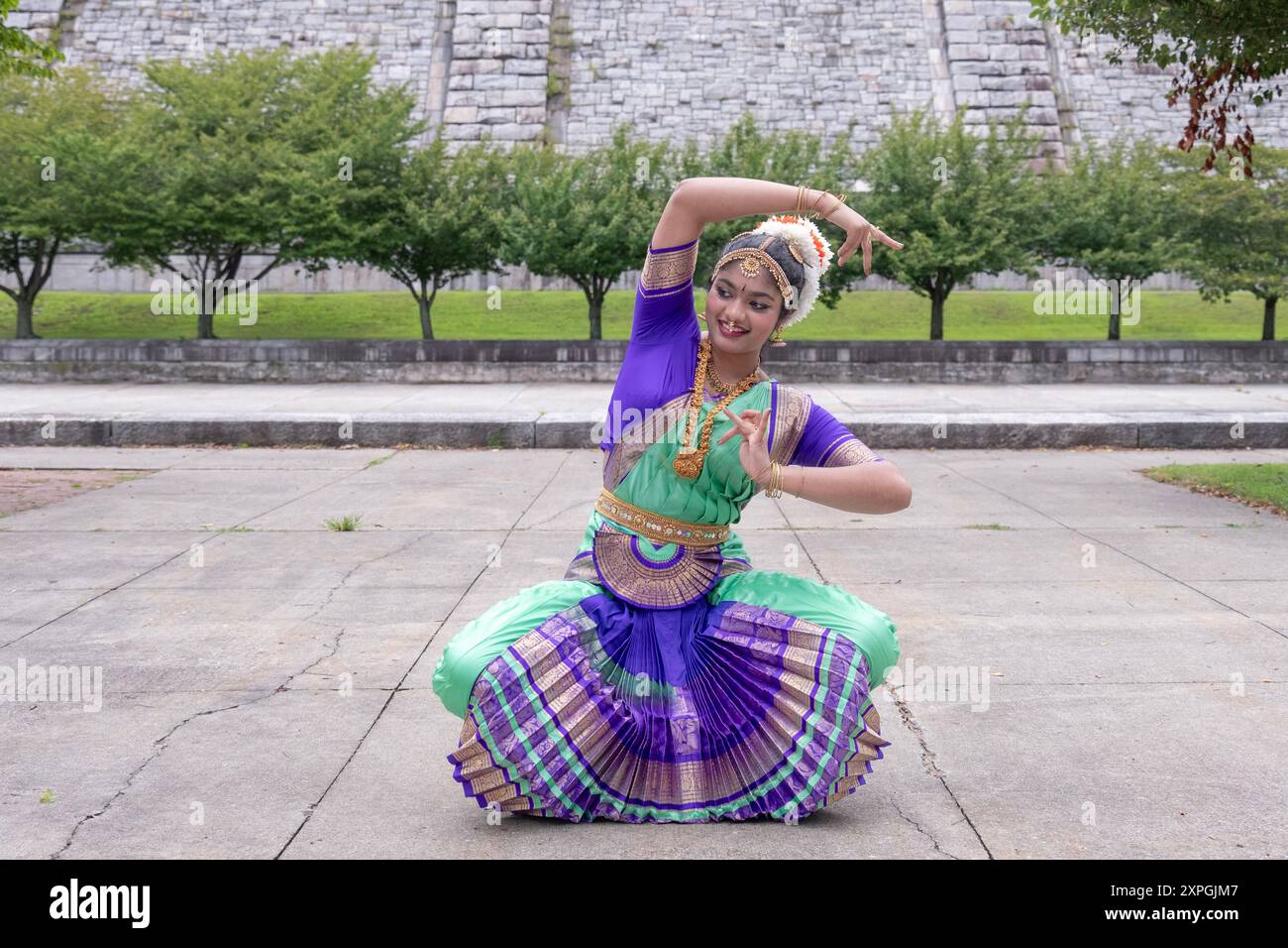 A dancer from the Natya Anubhava Dance Academy at Kensico Dam Plaza ...