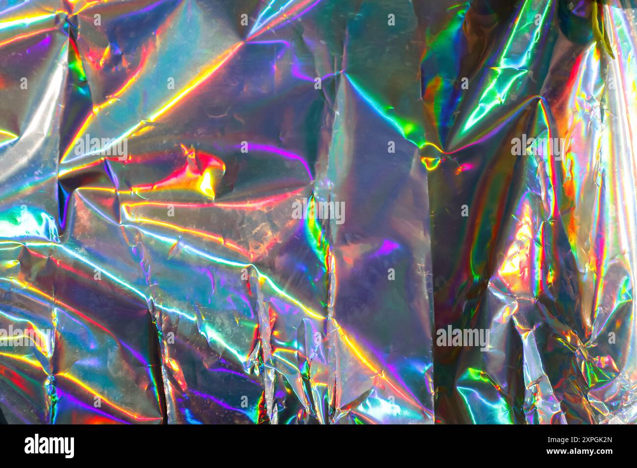 Iridescent foil with colorful holographic background, pink and rainbow ...
