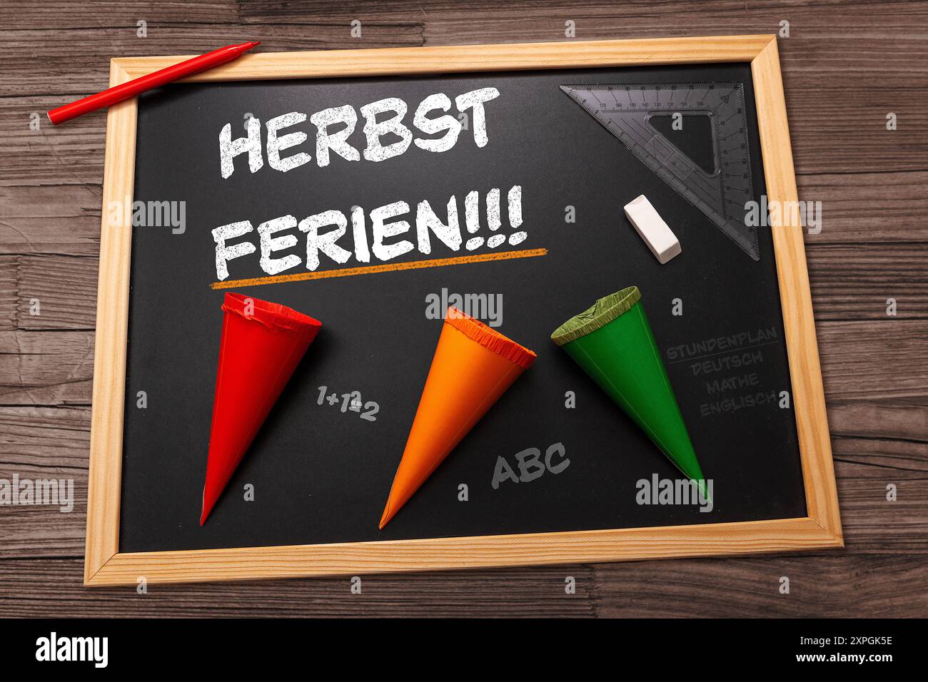 5 August 2024: Fall break Lettering on a blackboard with school cones ...