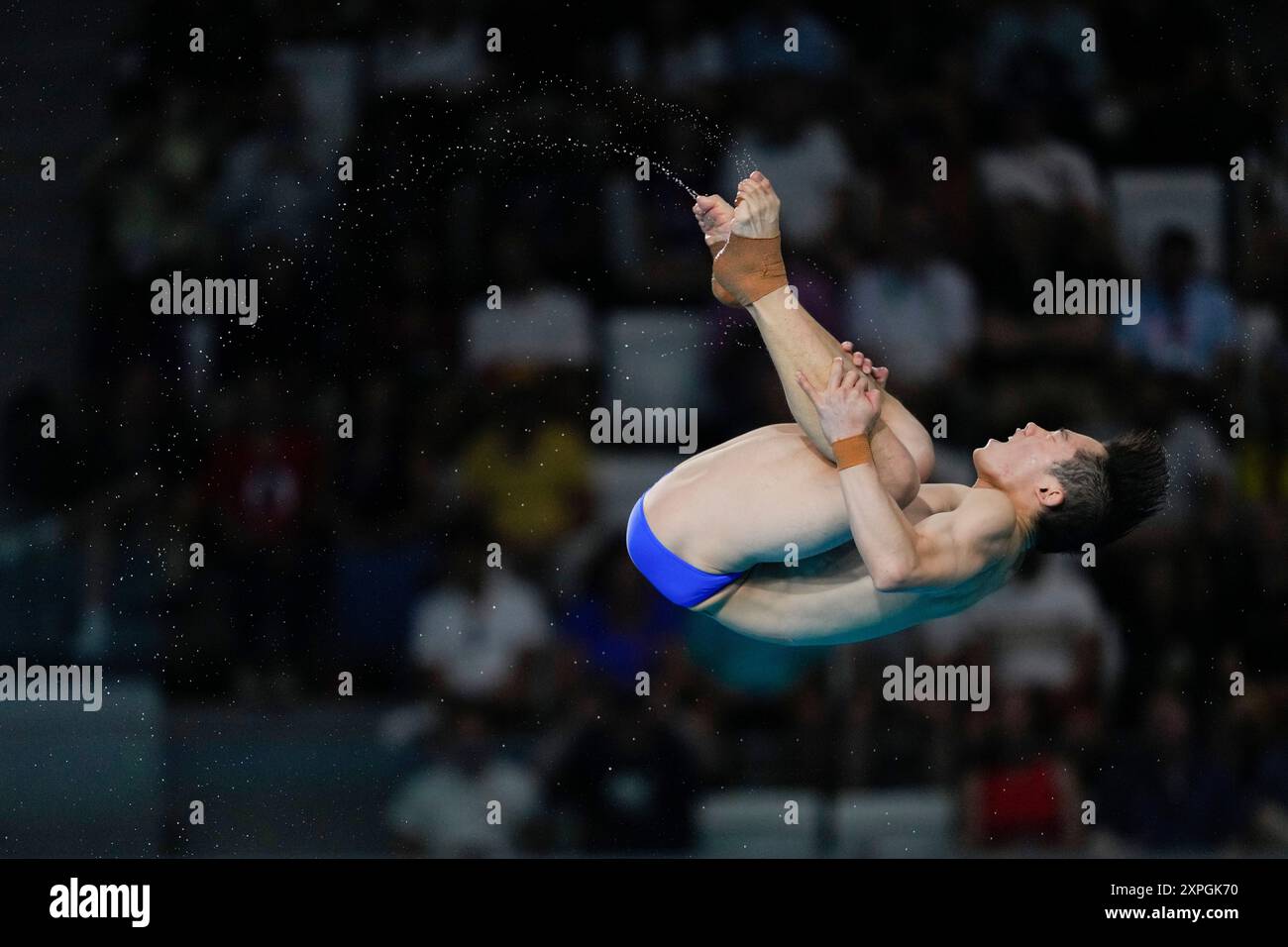 China's Wang Zongyuan competes in the men's 3m springboard diving ...
