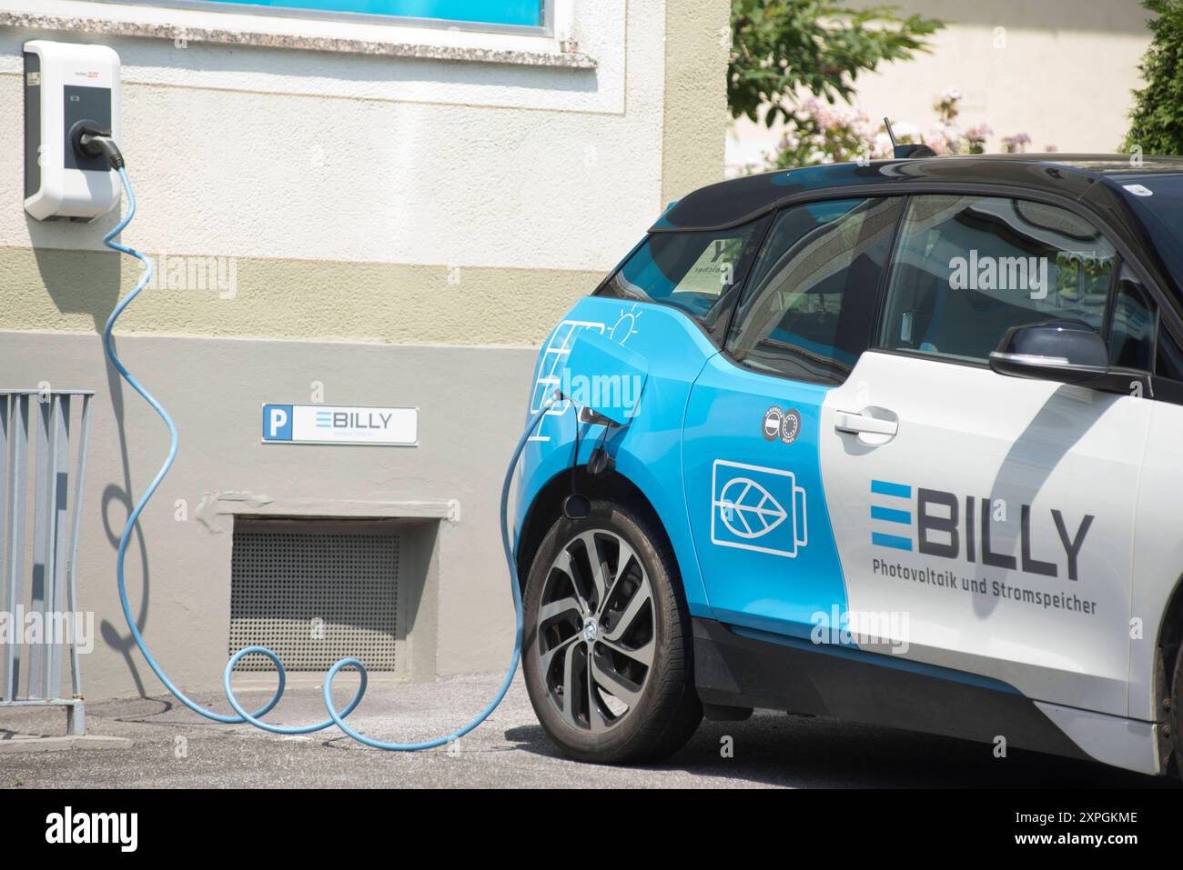 electric vehicle charging station sign, power plug and green mobility ...