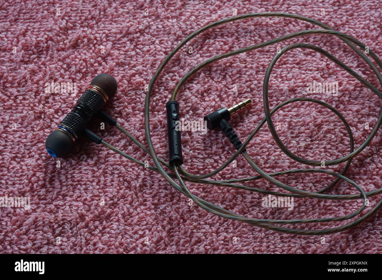 Red earphone hi-res stock photography and images - Alamy