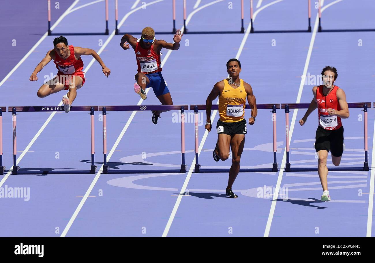 Paris, France. 6th Aug, 2024. Xie Zhiyu (1st L) of China competes ...