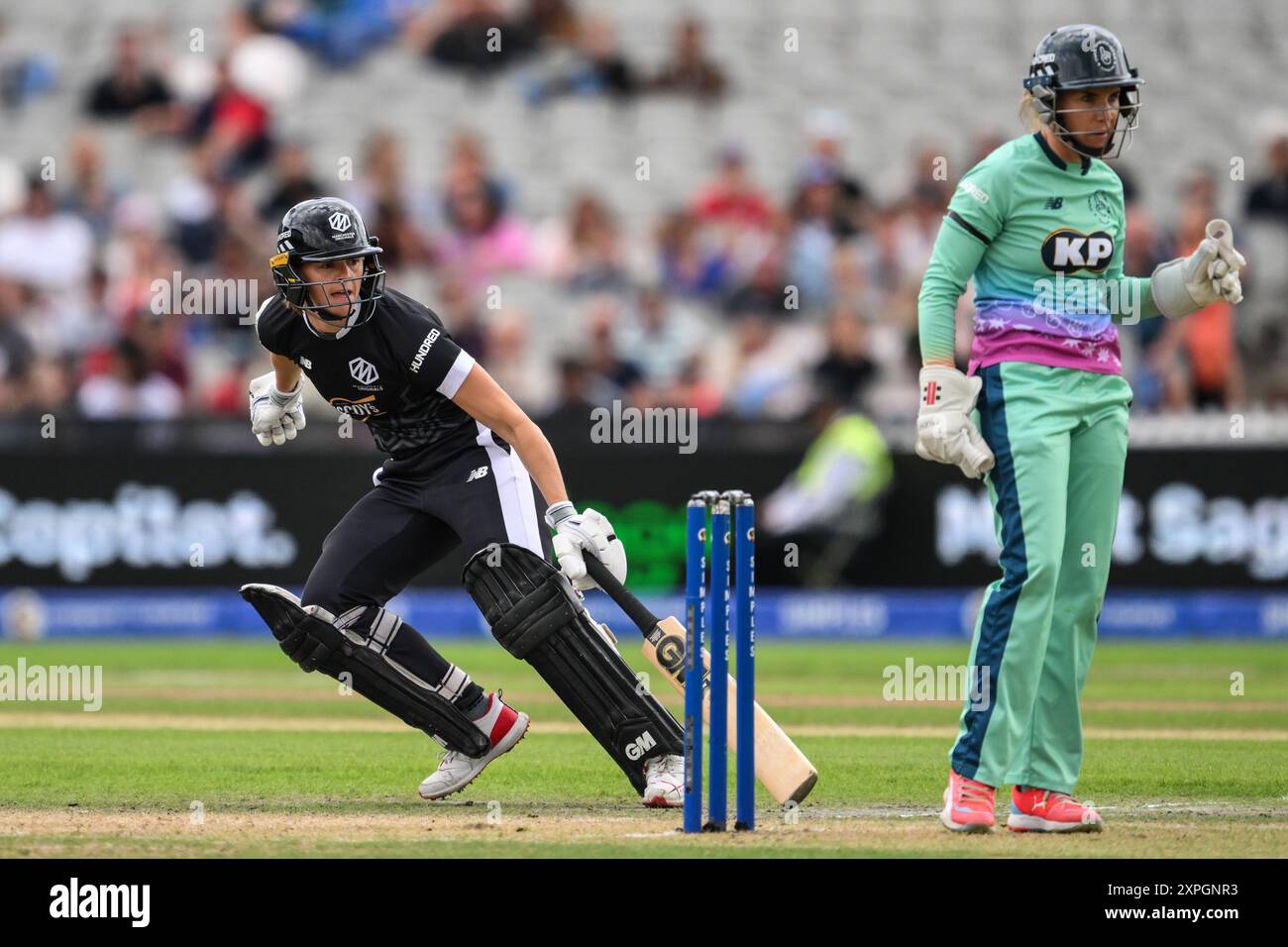 Eve Jones of Manchester Orignals reaches for the crease during the The ...