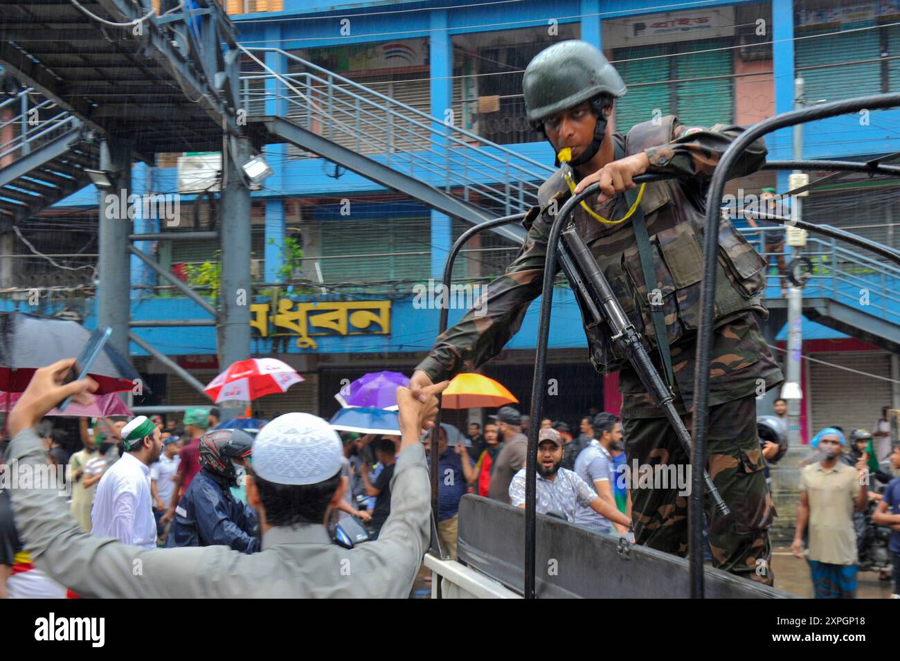 People celebrating in joyous procession across the city of Sylhet to ...