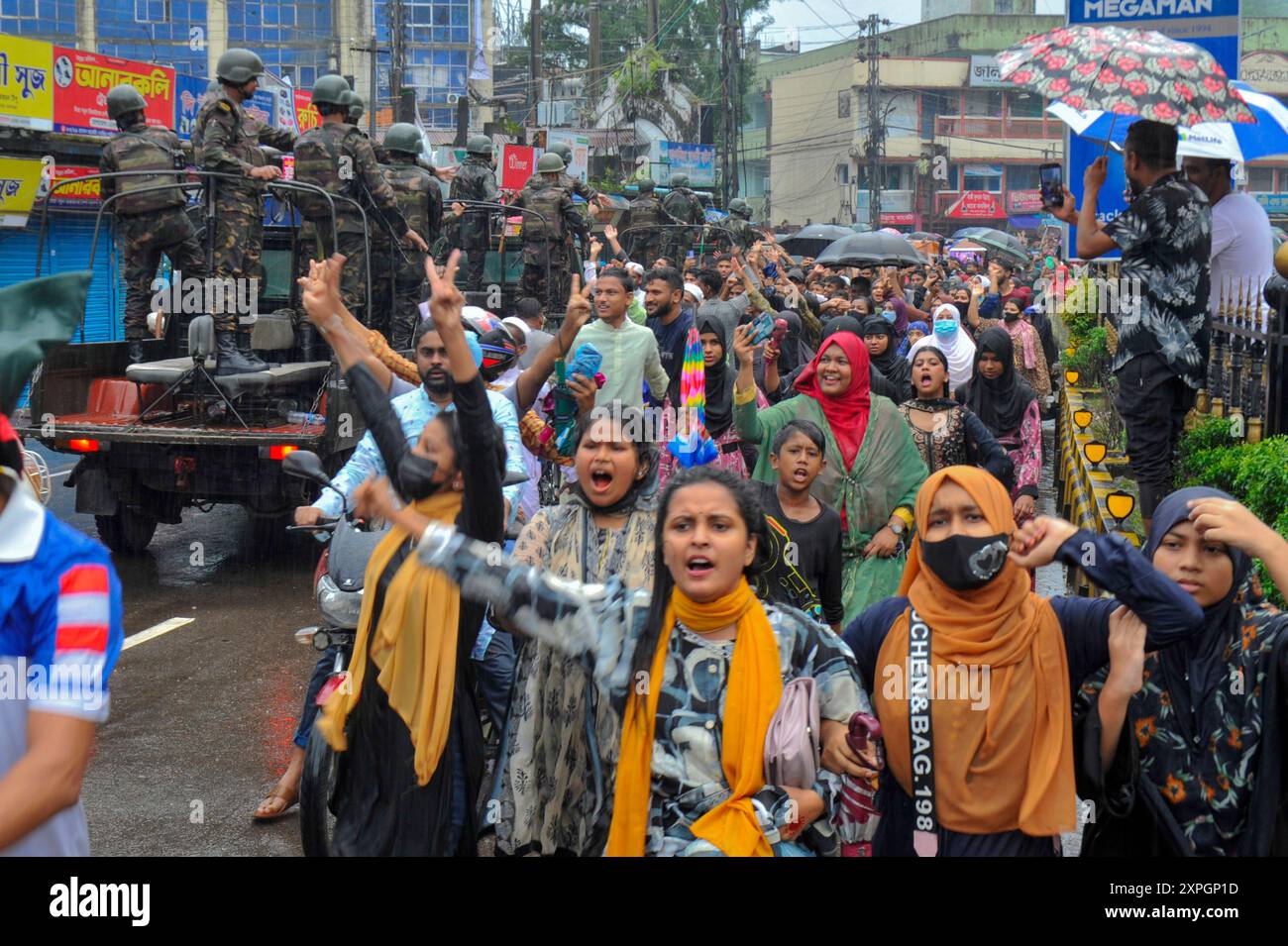 People celebrating in joyous procession across the city of Sylhet to ...