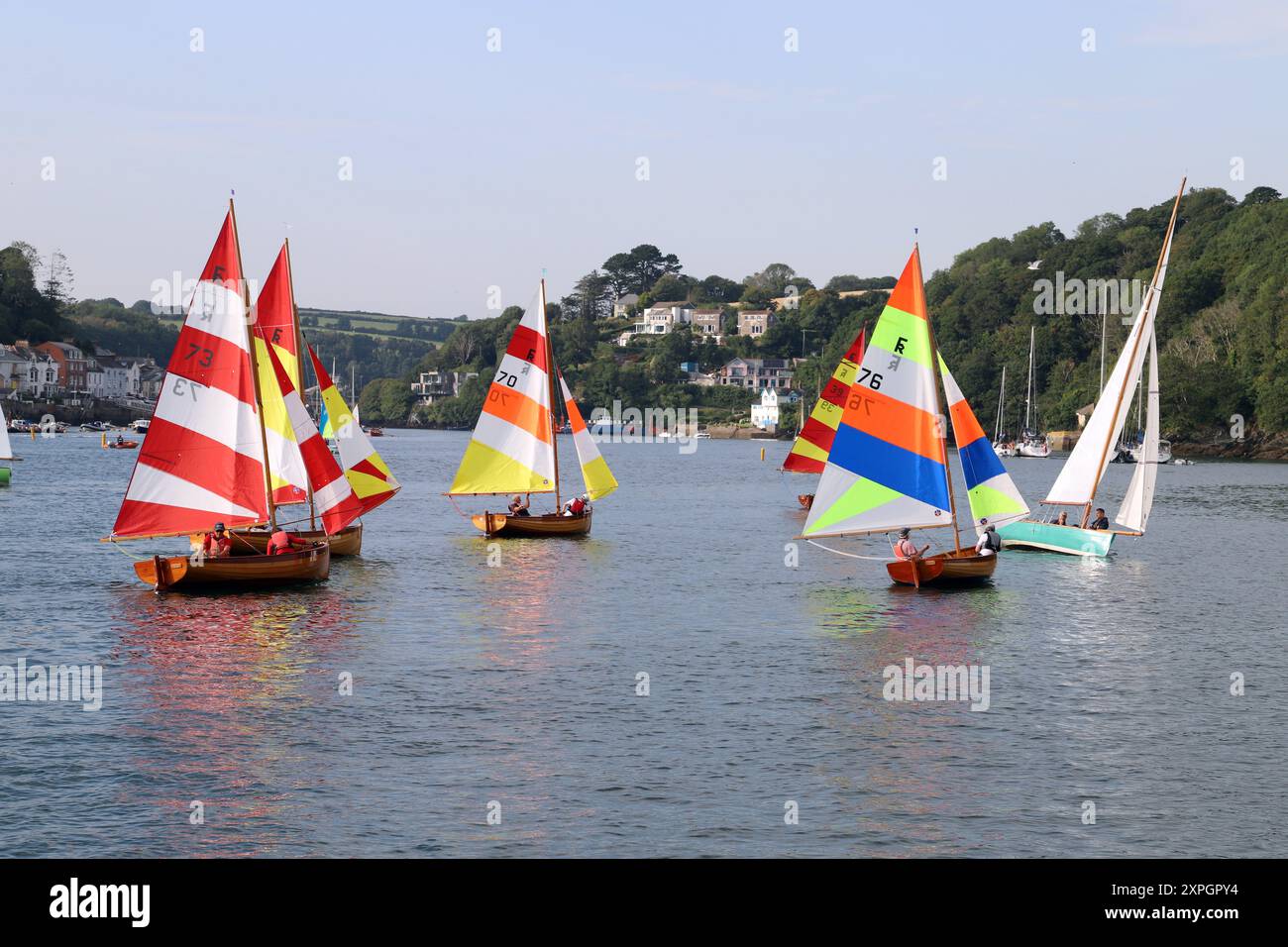 Fowey River Class Dinghies racing in Fowey Harbour Stock Photo - Alamy
