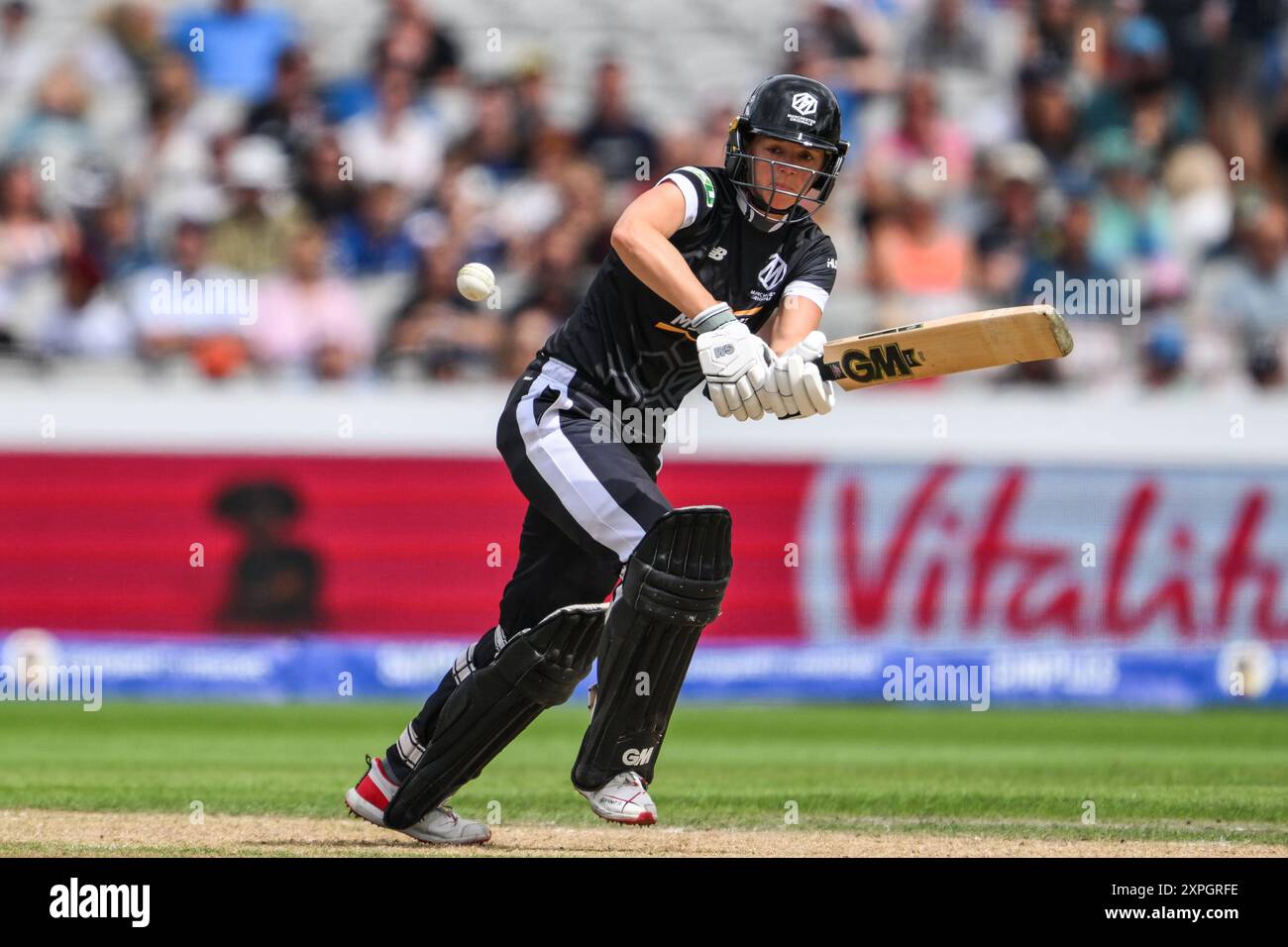 Eve Jones of Manchester Orignals skips the ball for a single during the ...