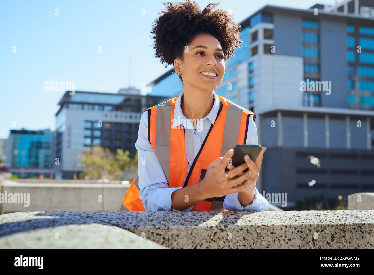 Happy Female Construction Worker Taking a Break Outside in the City ...