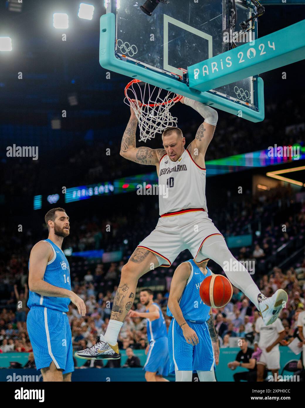 Paris, France. 6th AUG 2024. Daniel Theis (GER) makes a dunk Paris 2024 Olympic Games Basketball ...