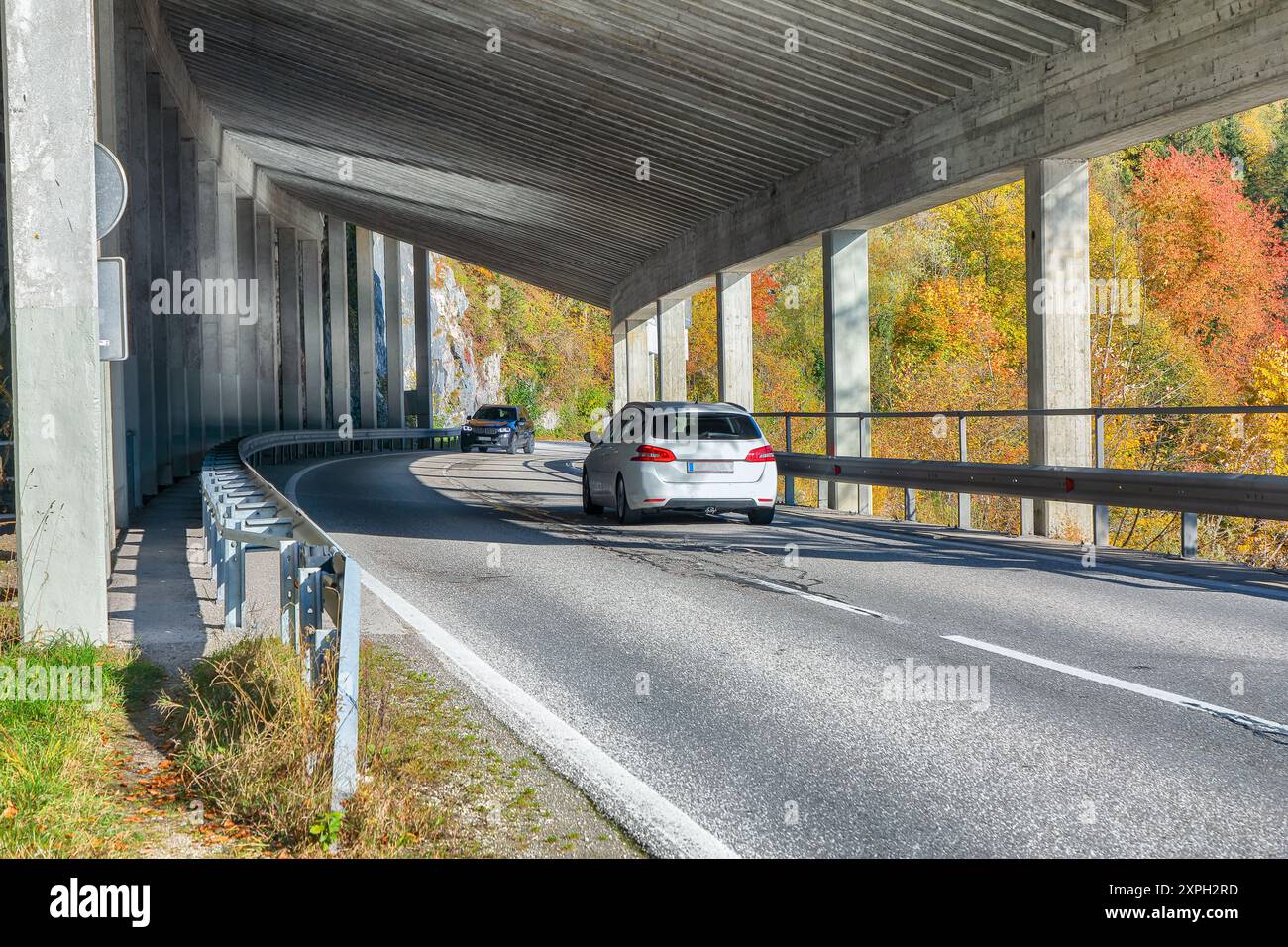 Stunning view of road and tunnel near famous Hallstatt mountain village ...