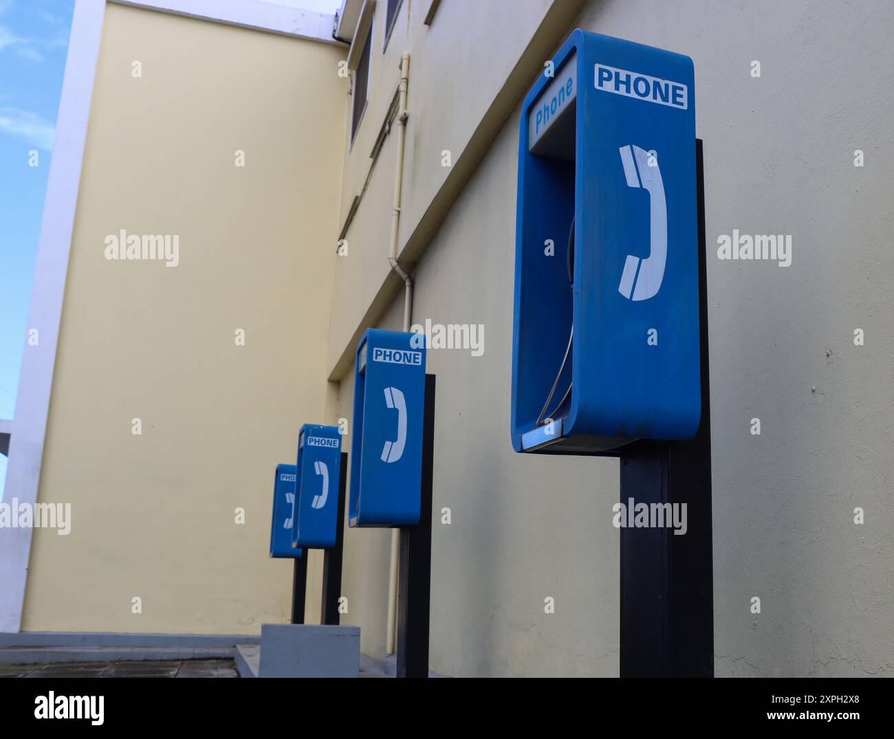 Four, blue phone booths Stock Photo - Alamy