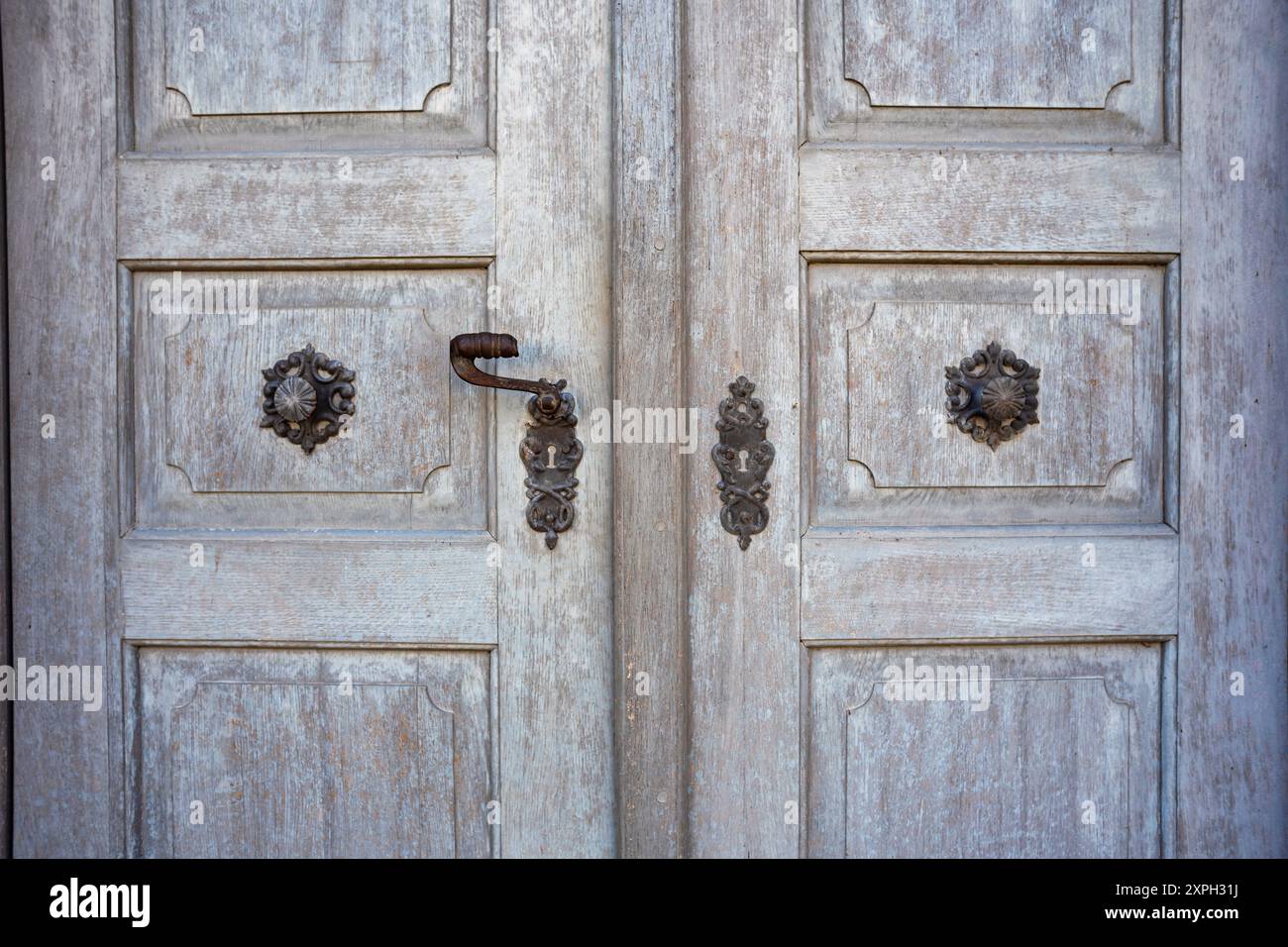 .Old, rustic, hardwood entrance door pattern and details. Close up shot ...