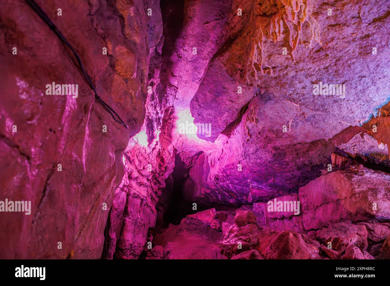 Hole seen from a top angle perspective in an underground rock formation ...
