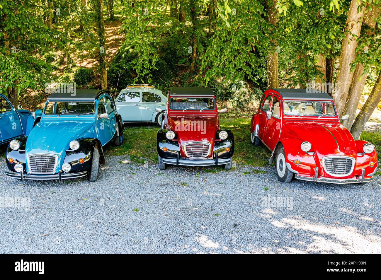 Group of old convertible luxury cars with soft top, grey, blue and ...