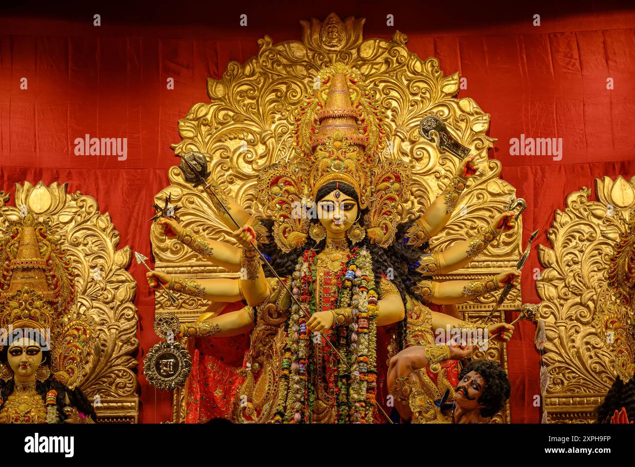 Idol of Goddess Devi Durga at a decorated puja pandal in Kolkata, West ...