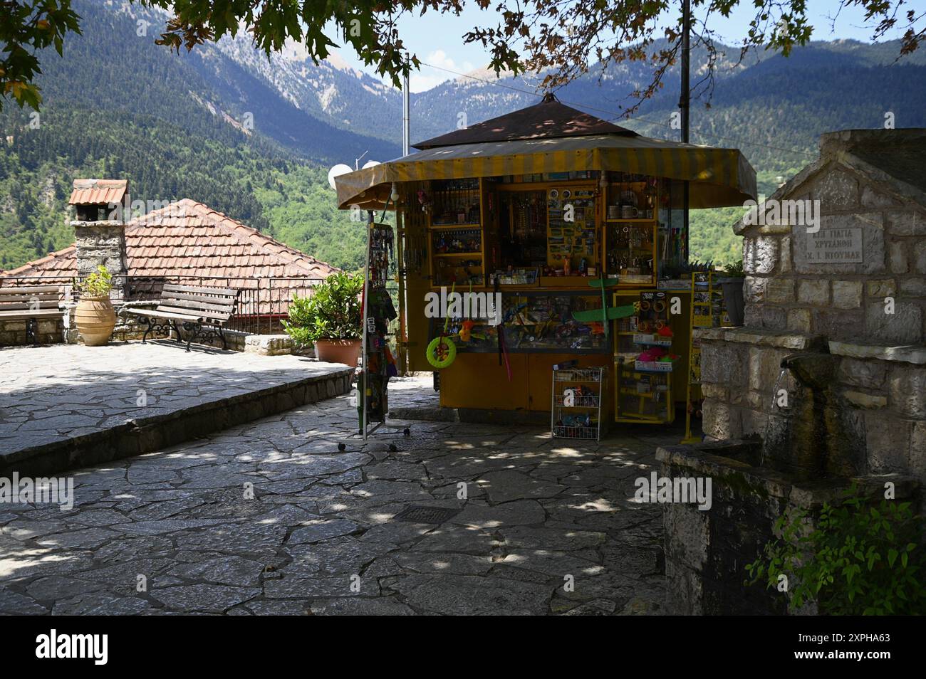 Traditional Greek wooden kiosk on the main square of Megalo Chorio in ...