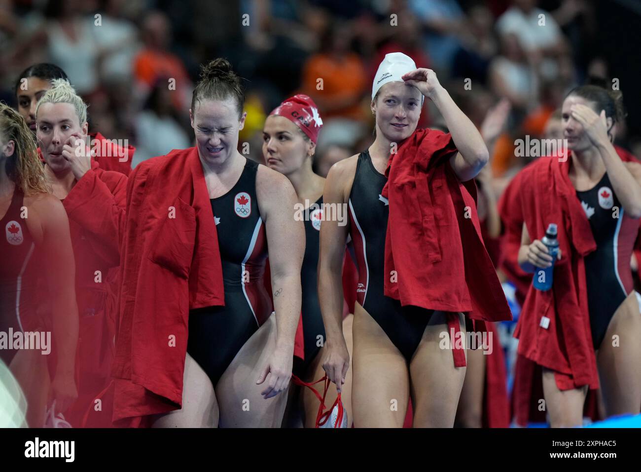 Canadian players leave loosing a women's quarterfinal match between ...