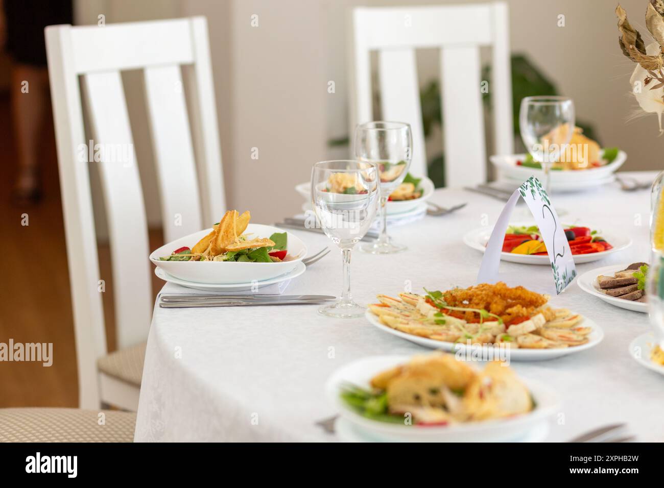 Wedding banquet in restaurant, covered round table for guests, white ...