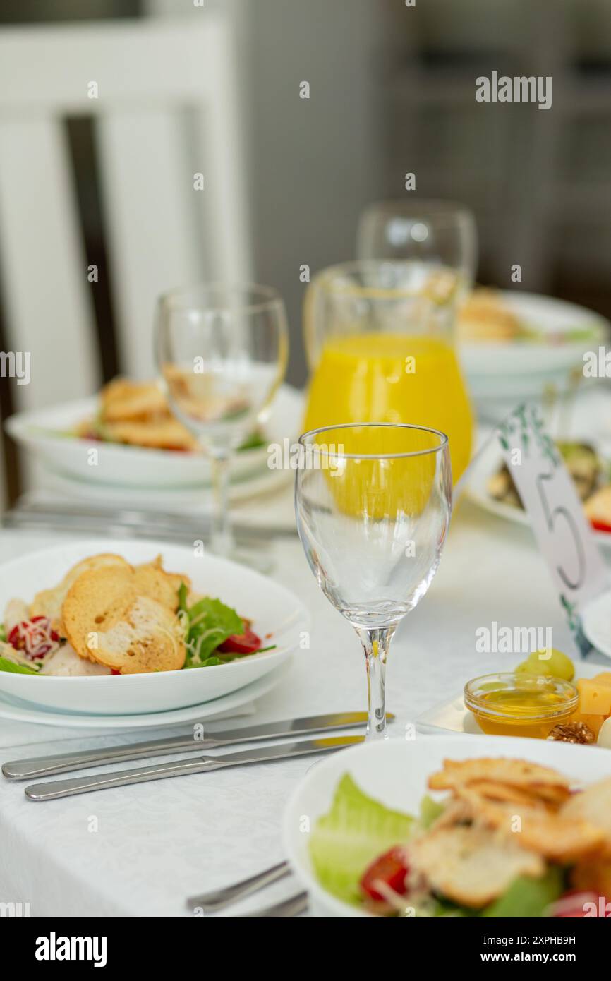 Wedding banquet in restaurant, covered round table for guests, white ...
