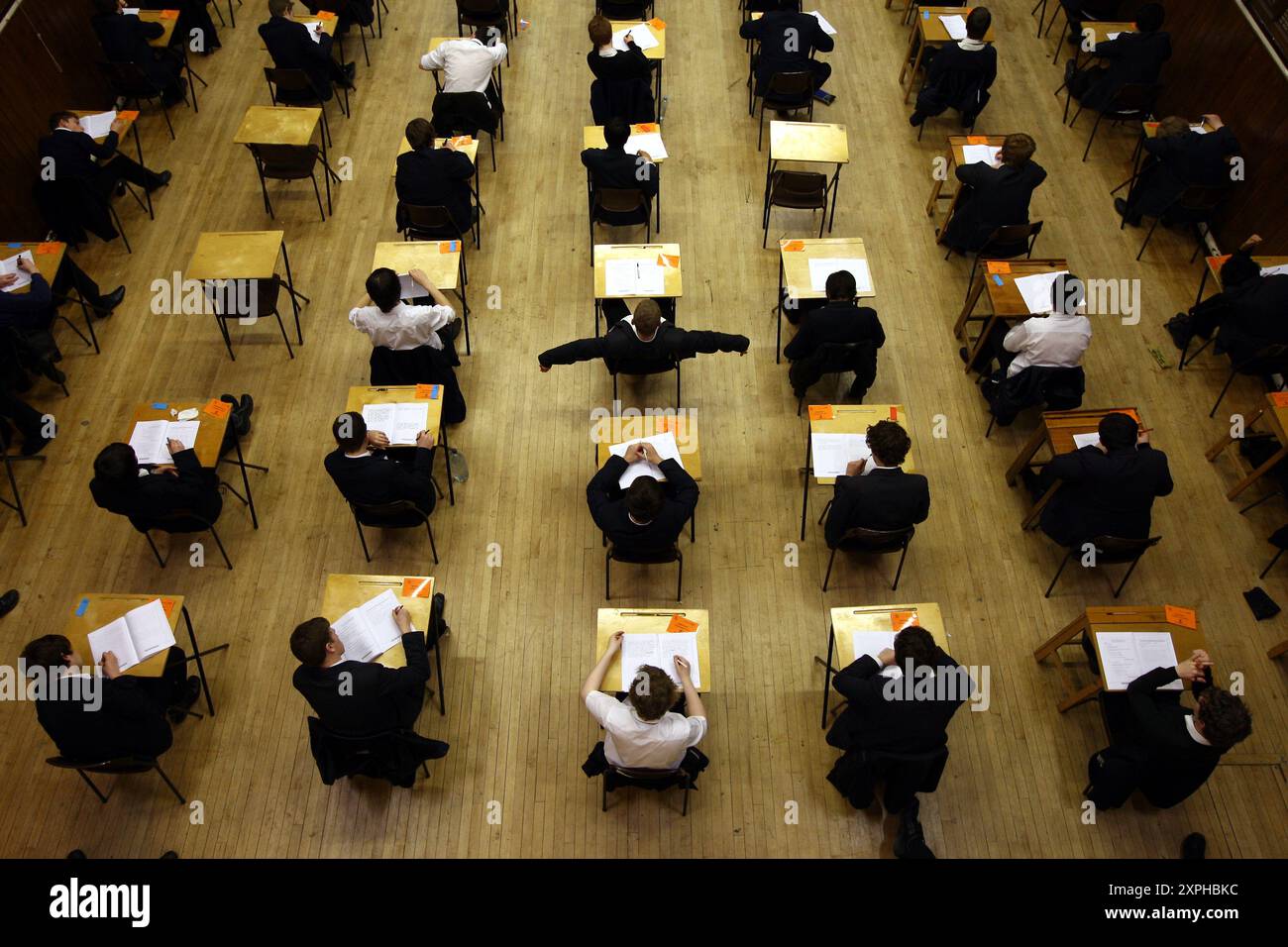 File photo dated 07/03/12 of a general view of pupils sitting an exam ...