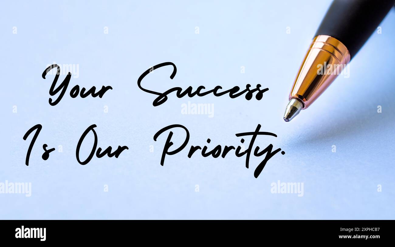 Your success is our priority text with close up pen background ...