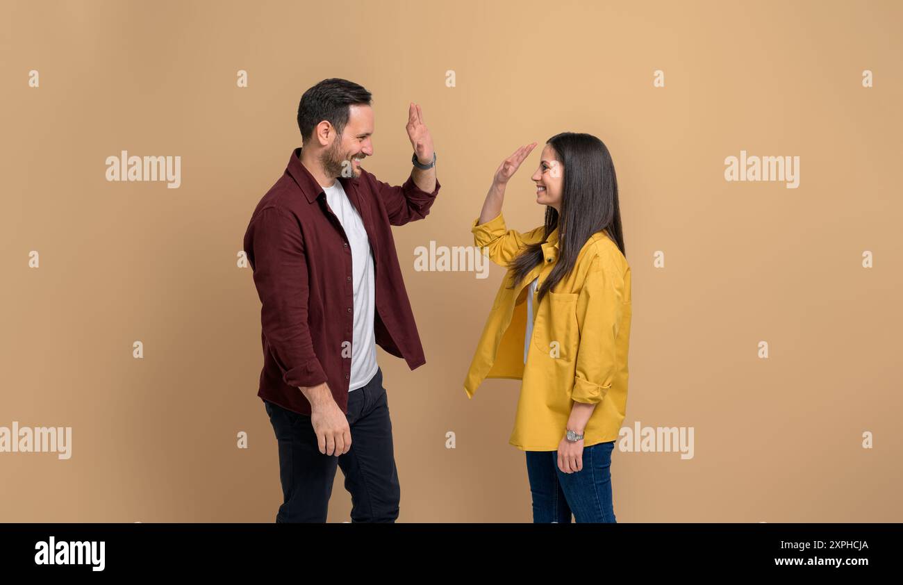 Ecstatic young woman clapping hands hi-res stock photography and images ...