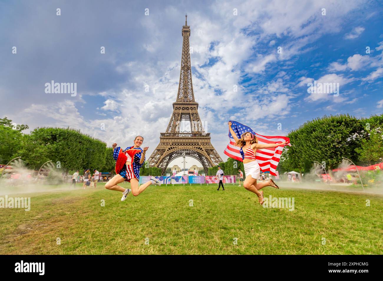 Patriotic American Woman jumping and cheering for Team USA and the ...