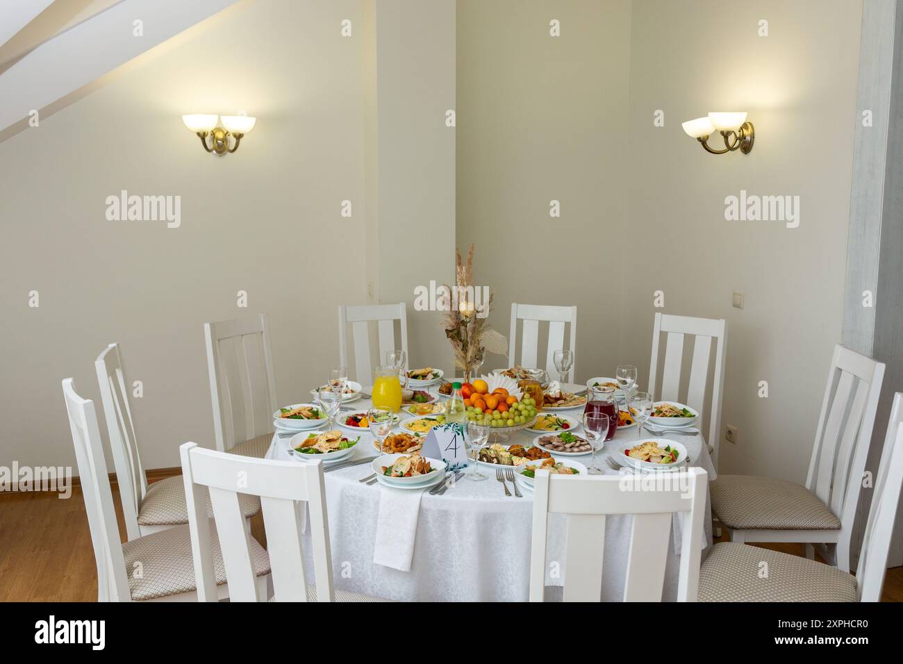 Wedding banquet in restaurant, covered round table for guests, white ...