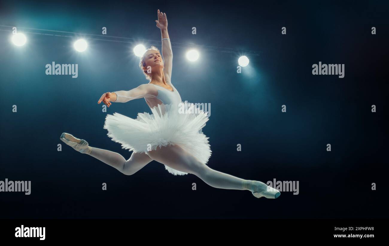Elegant Ballet Dancing Ballerina White in Tutu Executes Flawless Grand ...