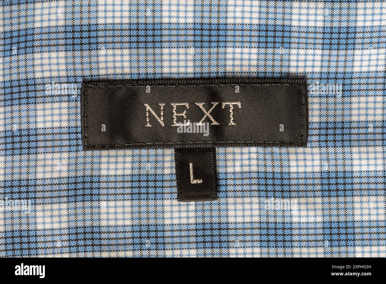 Next label in clothing hi-res stock photography and images - Alamy