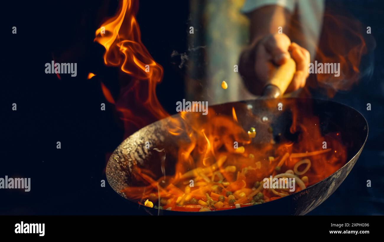 Flaming stir fry wok dish hi-res stock photography and images - Alamy