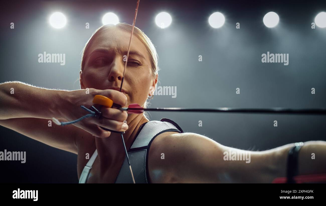 Female archer aiming target hi-res stock photography and images - Alamy