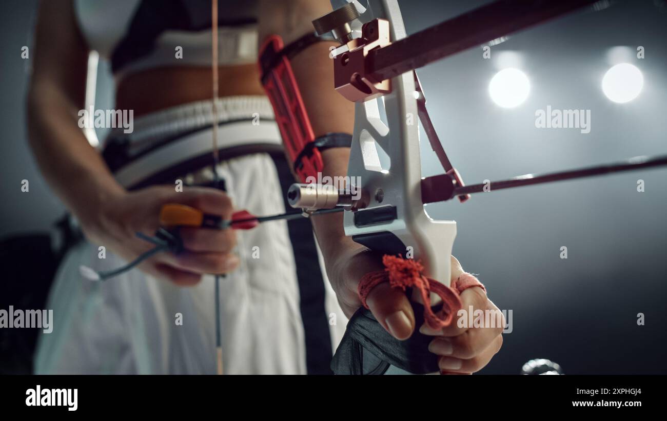 Low Angle Shot Of an Anonymous Female Archer Holding a Modern Compound ...