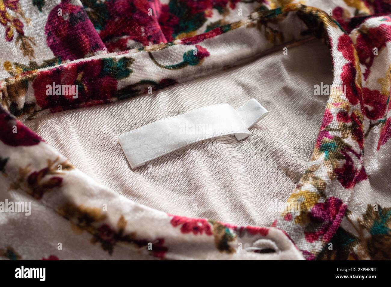 laundry care clothing label on fabric texture Stock Photo - Alamy