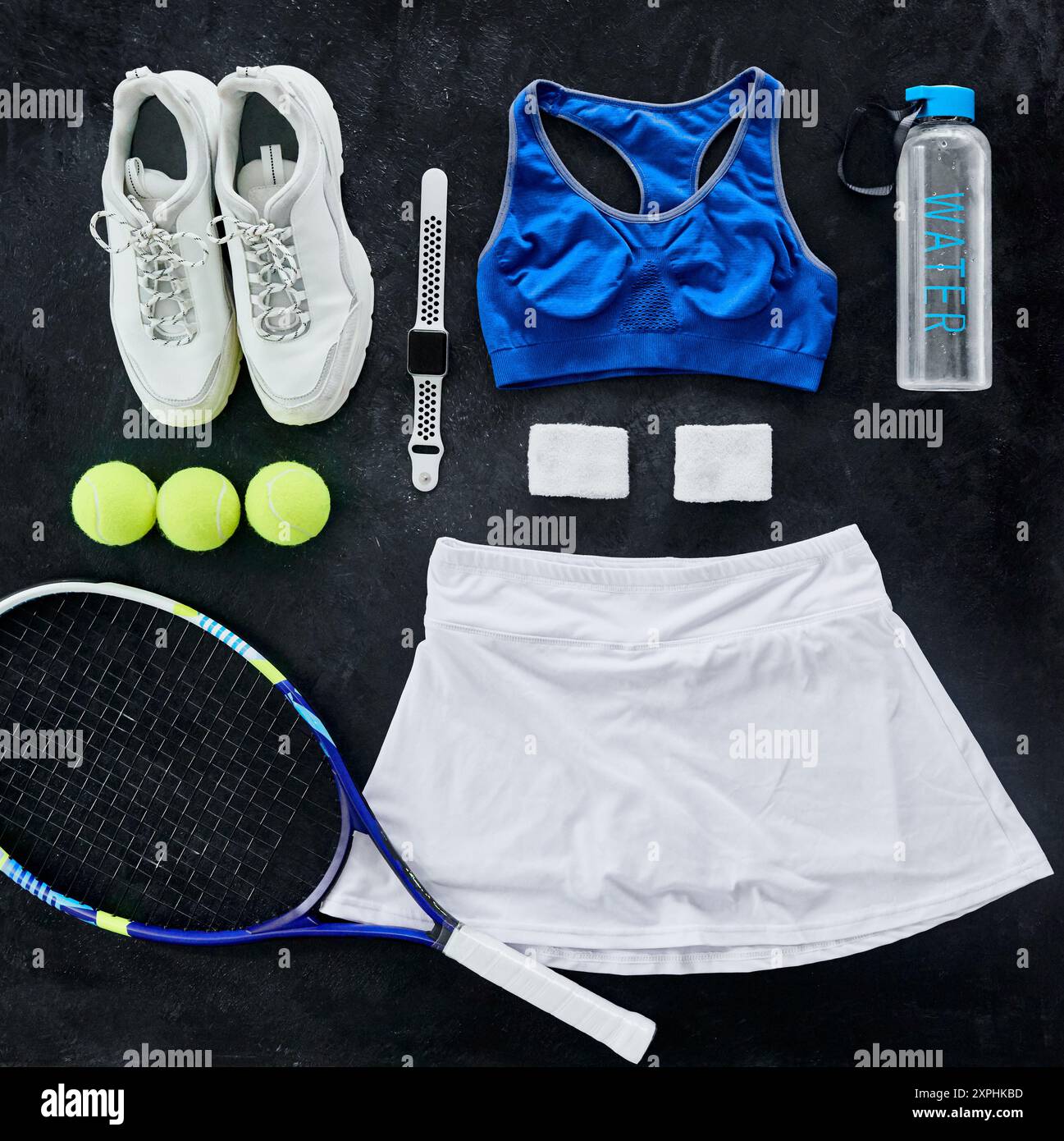 Top view, fitness clothes and tennis equipment, shoes and smart watch ...
