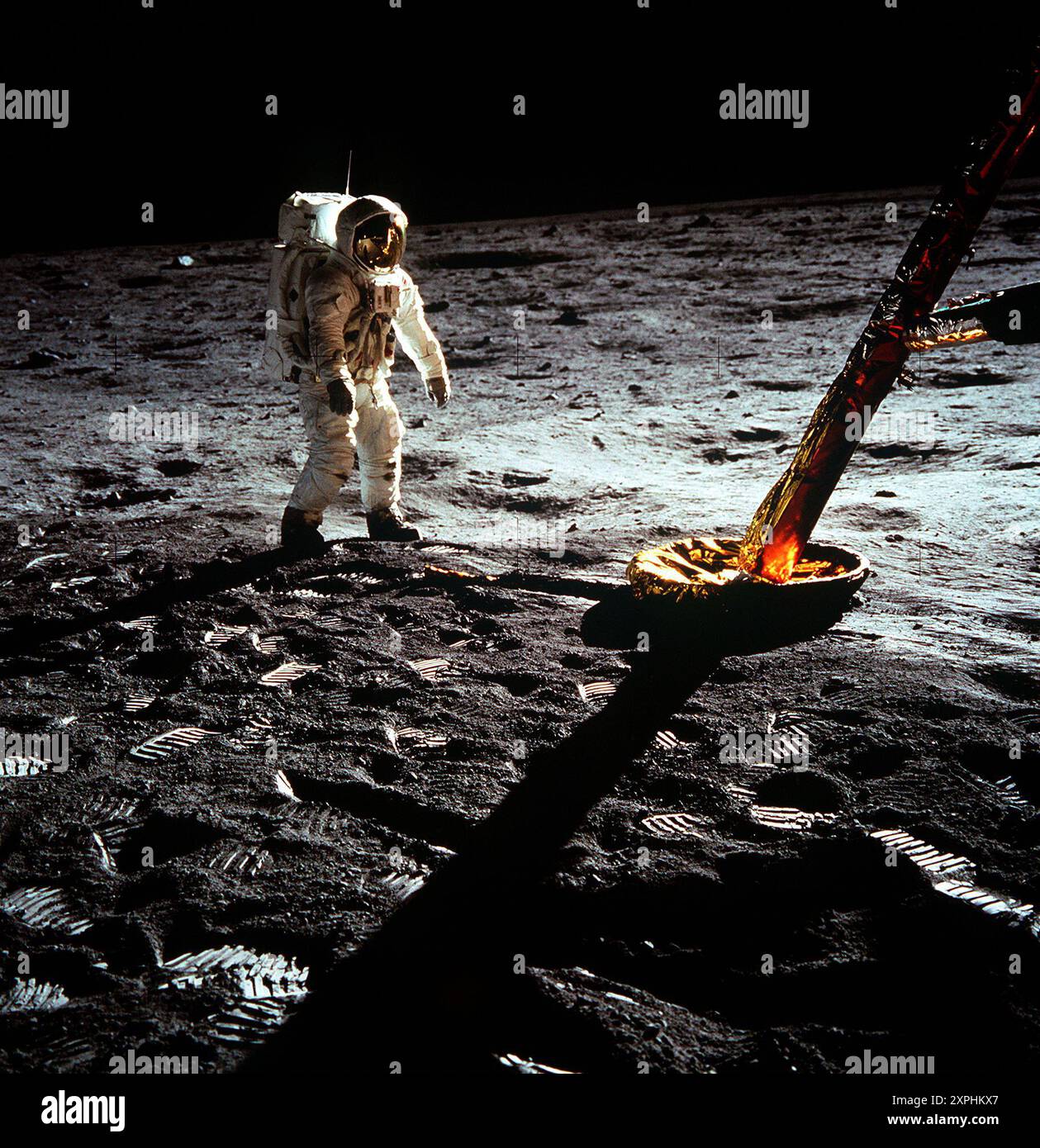 Astronaut Edwin E. Aldrin Jr., lunar module pilot, walks on the surface ...