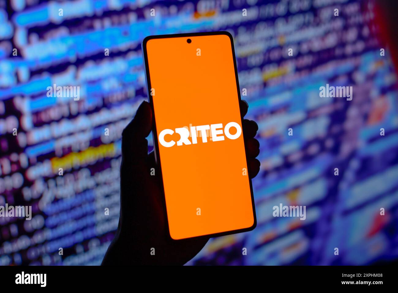 In this photo illustration, the Criteo logo is displayed on a smartphone screen Stock Photo - Alamy