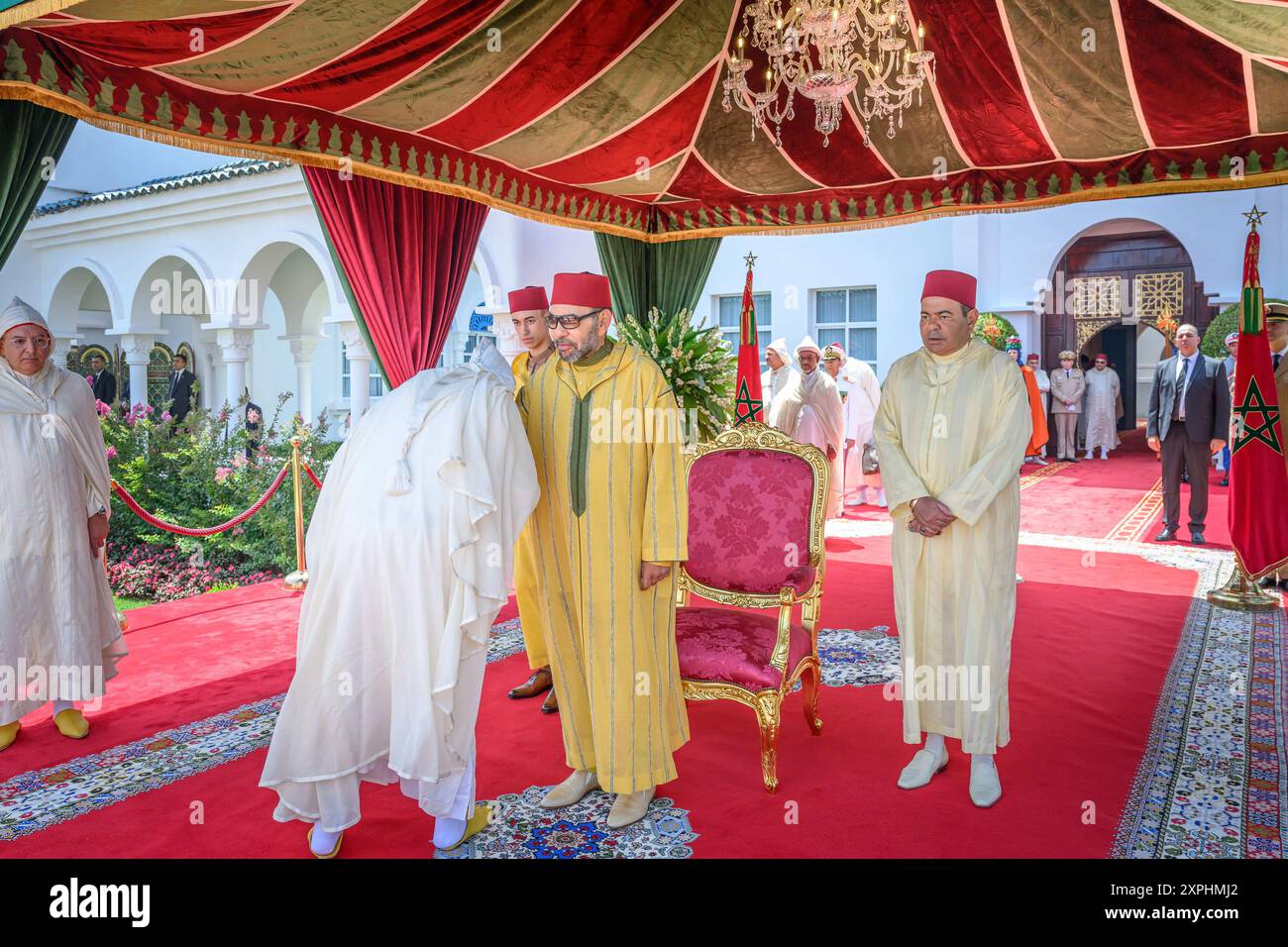 Rabat, Morocco. 31st July, 2024. Morocco's King Mohammed VI (center), his son Crown Prince ...