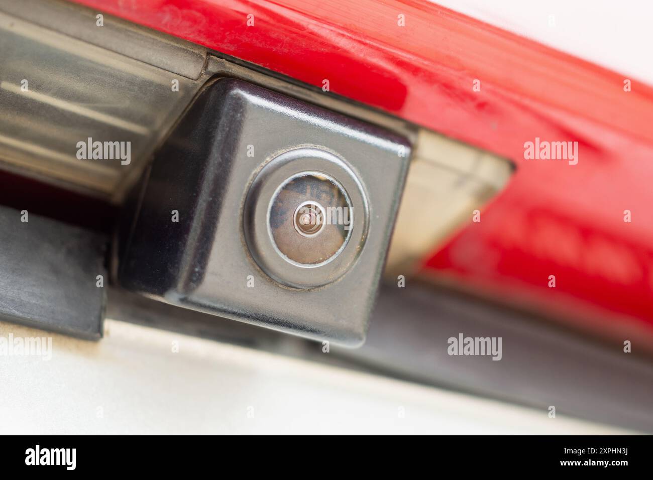 Red car rear view camera close up for parking assistance Stock Photo ...