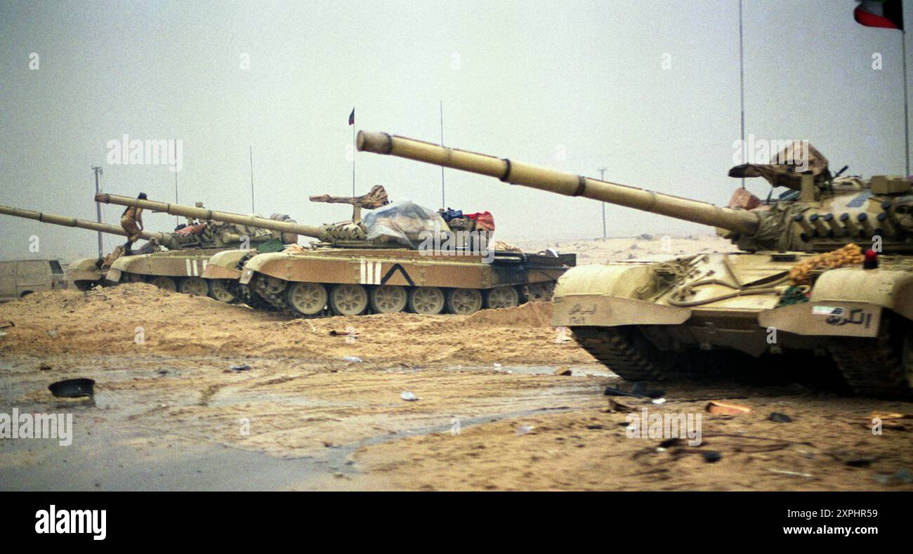 5th March 1991 Kuwaiti M-84 main battle tanks parked at the side of the ...