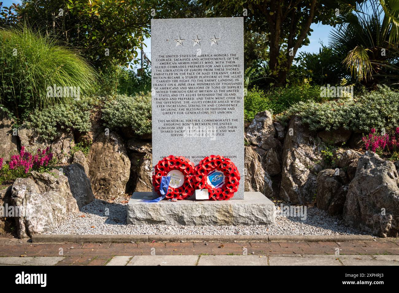 The granite memorial and poppy wreaths to the memory of WW2 US armed ...