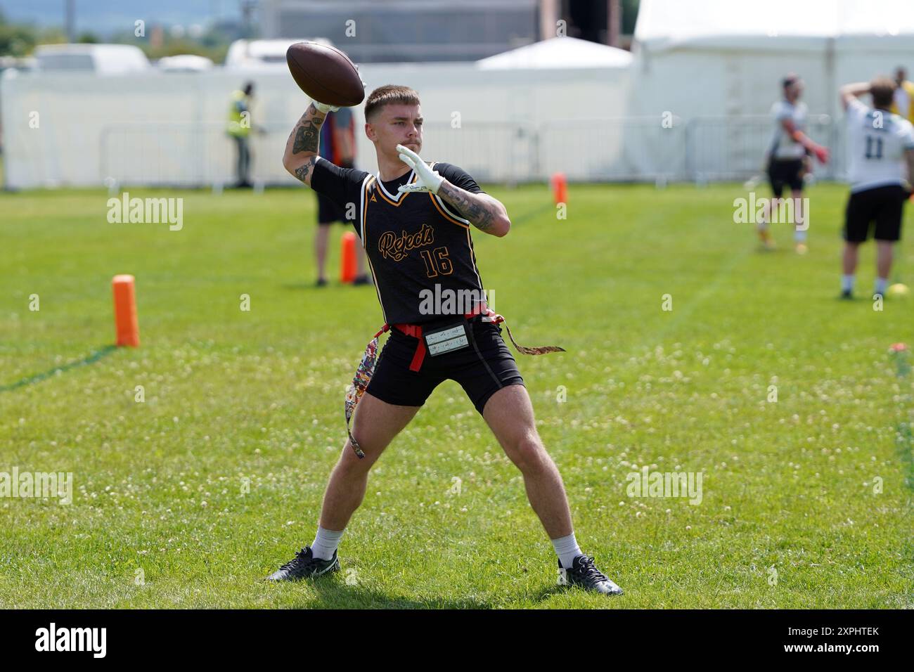 Male flag football quarterback preparing to throw the ball Stock Photo ...