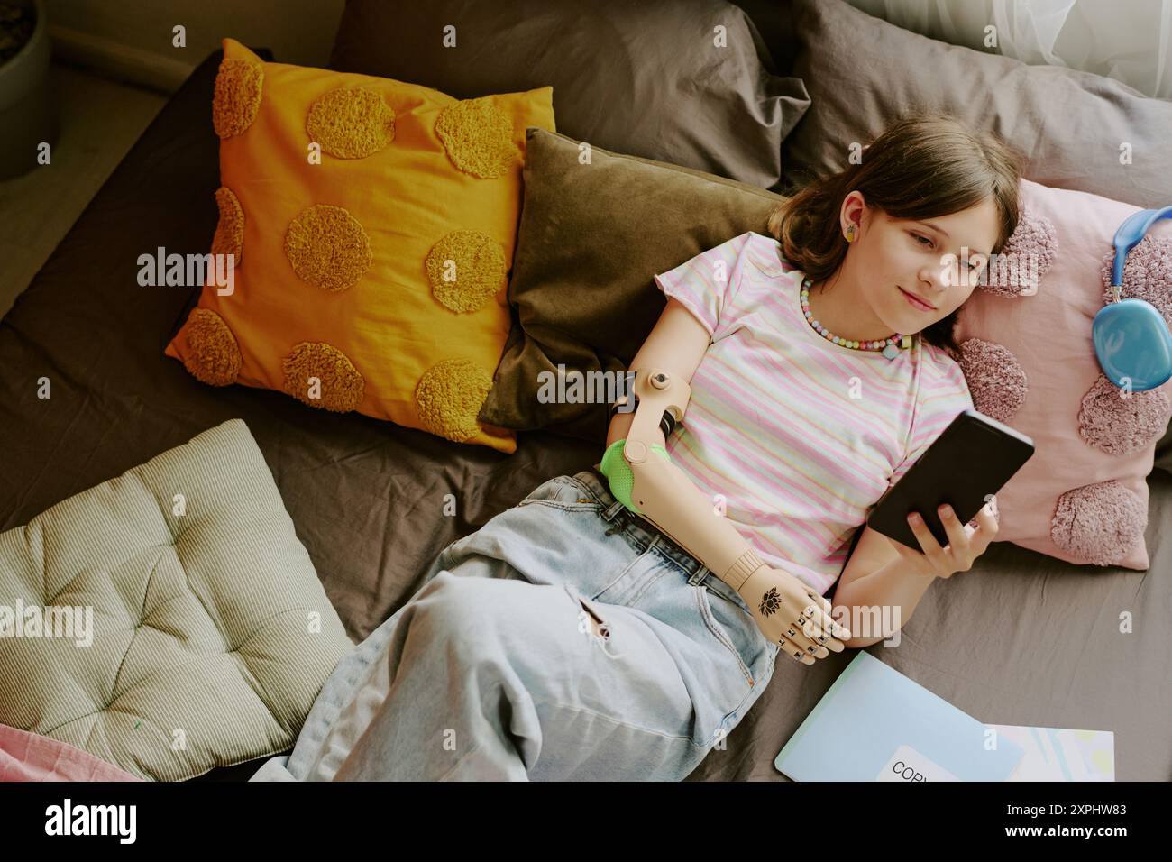 Teen Girl Looking At Phone Screen Stock Photo - Alamy