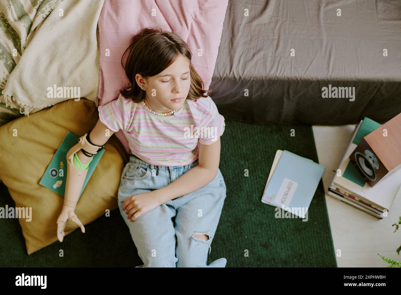 Tired Teen Girl Sitting With Eyes Closed Stock Photo - Alamy